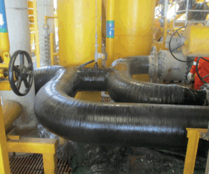 Composite wrapping for piping systems and pipe reinforcement