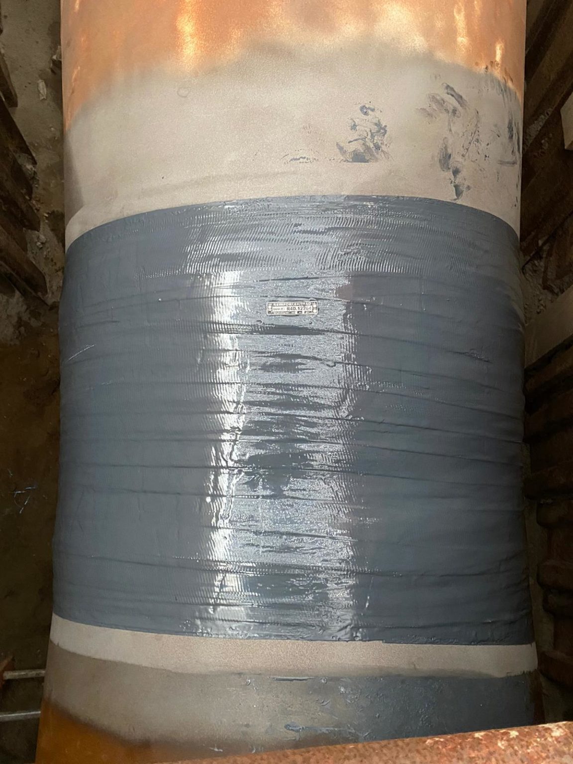 Composite wrapping for piping systems and pipe reinforcement